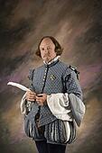 William Shakespeare in period clothing holding feather pen standing ...